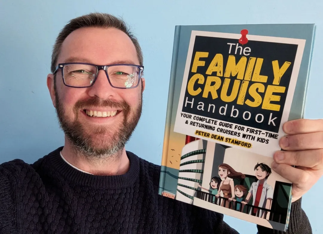Book-Holding.webp – Cruise Family
